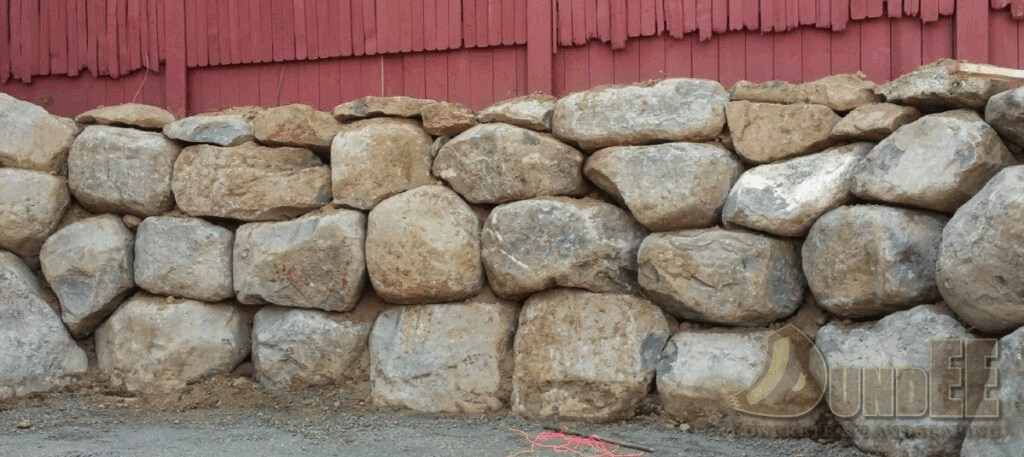 Boulder Retaining Walls - Dundee Concrete and Landscaping LLC